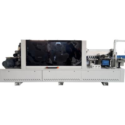 China Industrial Edge Banding Machine 9 Stations 32m/min Double Trimming Wood Panel Edger for sale