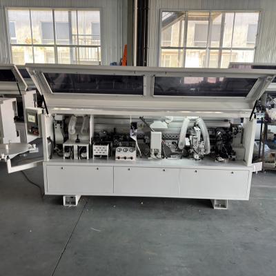 China BHM300 Fully Automatic Edge Banding Machine 380V 7KW for Woodworking 10-60mm Panel for sale