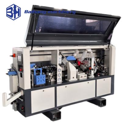China Free Shipping High Quality Automatic Wood Edge Bander Machine Featuring Engine Bearing Motor Core Components for sale