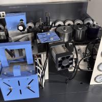 China Free Shipping High Quality Automatic Wood Edge Bander Machine Featuring Engine Bearing Motor Core Components for sale