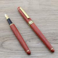China Rosewood Fountain Pen With Custom Logo Hand Polishing Wooden Craft Pen Business Gift for sale