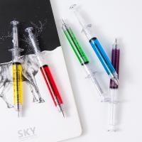 China Creative Syringe Style Ballpoint Pen Colorful Oil Filling Plastic Ball Pen for sale