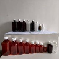 China 473ml PET Plastic Empty Arch Brown Cough Syrup Bottle with White Cap and Custom Label Printing for sale