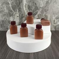 China 10ml HDPE Plastic Bottle with PP Screw Cap and 30ml Measuring Cup for Hair Dye for sale