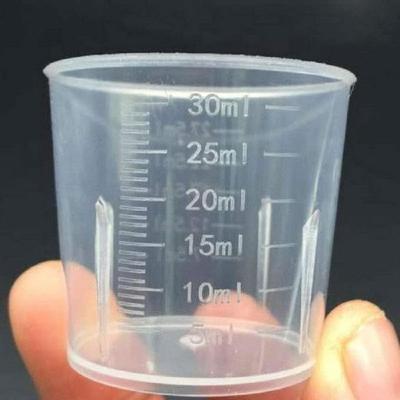 China Transparent PP Plastic Measuring Cup 30ml 1oz for Laboratory Food Beverage Industry for sale