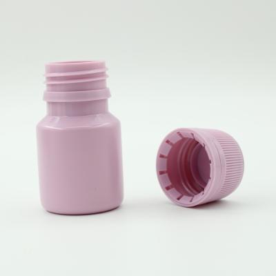China 30ml 2oz Pink HDPE Plastic RX Bottle with Child Resistant Closure for Liquid Medication for sale