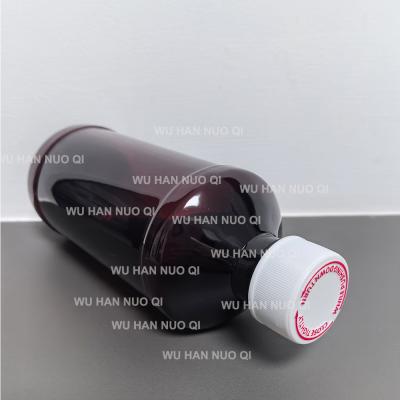 China Amber 16oz 500ml PET Oblong Medicine Bottle with Protective Seal for Liquid Medications for sale