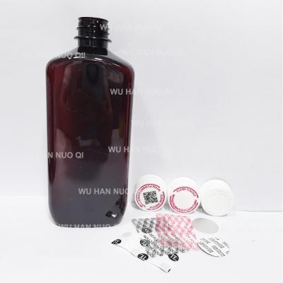 China 16 oz Oval Amber PET Plastic Medicine Bottles 500ml with Red CRC Caps for Liquid Medicines for sale