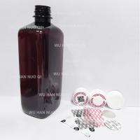 China 16 oz Oval Amber PET Plastic Medicine Bottles 500ml with Red CRC Caps for Liquid Medicines for sale