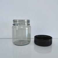 China 200ml 250ml Round PET Plastic Bottle with Black Anti Theft Screw Cap for Food Packaging for sale