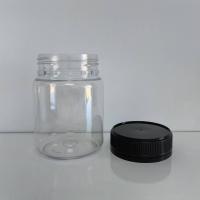 China 200ml 250ml Round PET Plastic Bottle with Black Anti Theft Screw Cap for Food Packaging for sale