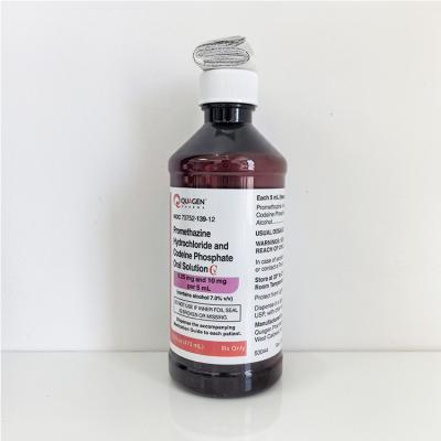 China 473ml Amber Glass Cough Syrup Bottle with CRC Red Caps for Liquid Medicine Packaging for sale