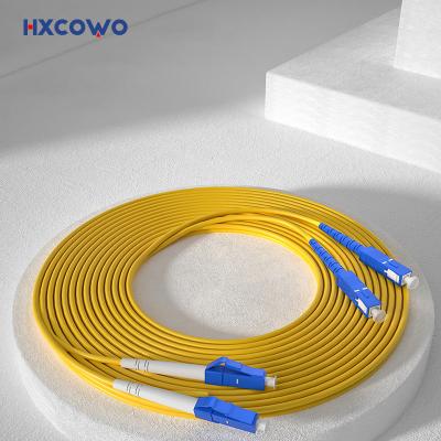 China HXCOWO FTTH Indoor SC/UPC-LC/UPC SM G657A2 Duplex Armored Fiber Cable Patch for Wired LAN for sale