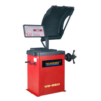 China 1000mm Car Wheel Balancing Machine 200RPM Automatic Wheel Balancer for sale