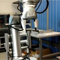 China Palletizing Robot With Robot Arm 6 Axis Of UR10e Payload 10kg Reach 1300mm For Packing Line for sale