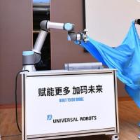 China Universal Robot UR 3e With 3KG Payload 6 Axis Industrial Robot Arm As Cobot For Engine Assembly for sale