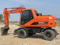 China Used DOOSAN DX140W-7 Wheel Excavator with Original Paint and Cummins Engine 112kW for sale