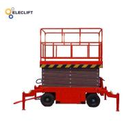 China 300KG Load Capacity Mobile Scissor Lift Manganese Steel Electric Platform Lift for sale