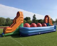 China Commercial Wipeout Inflatable Obstacle Course 7.5m x 3.9m with Big Balls Bouncer for sale