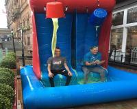 China Commercial Inflatable Gunge Roulette Tank 2.6m PVC Smile Game for Events for sale