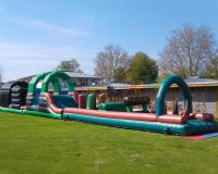 China 13.2×4.7×3M Commercial Inflatable Obstacle Course with Slide and Bounce House - 185KG Weight, 0.55mm PVC Material for sale