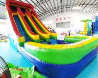 China TUV Certified Double Side Inflatable Water Slide Bouncer with Pool 110kg Commercial Grade for sale