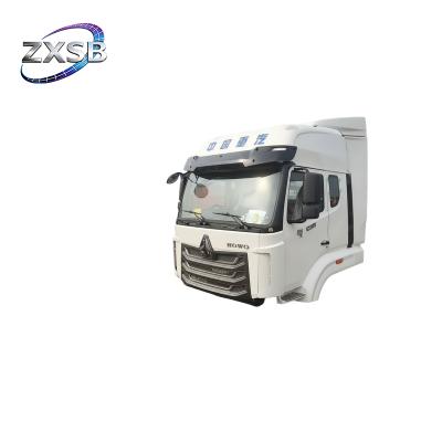 China HOWO NX Heavy Duty Tractor Truck Cab Assembly Regional Logistics 1000001 AH167V-1000001 for sale