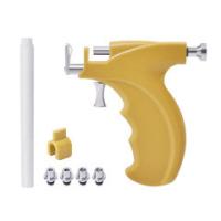 China Yellow Hospital Medical Ear Piercing Gun Kit for Ear Nose Navel Body Piercing with Accessories for sale