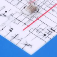 China Mid High Voltage Multilayer Ceramic Capacitors featuring Chinocera HHV0805R7102K101NTHJ for surface mount applications for sale