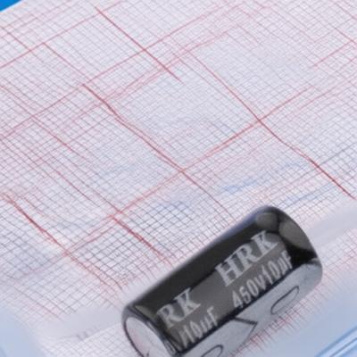 China plug in aluminum electrolytic capacitor HRK CD1101062WM1017VFL with black sleeve and white printing for sale