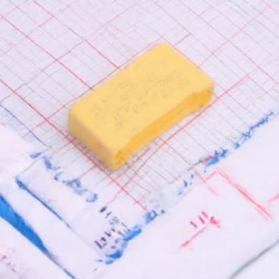 China Capacitor with vacuum evaporated metal electrodes and epoxy resin sealed case Jimson MRC103K300A04 for sale