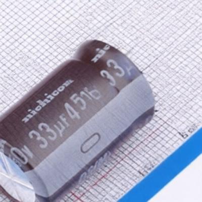 China Long Life Miniature Aluminum Electrolytic Capacitors Nichicon UCS2W330MHD With PET Sleeve Compliance for sale