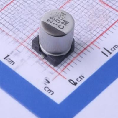 China Chip type aluminum electrolytic capacitor Nichicon UCM1H101MCL1GS with black print marking on case top for sale