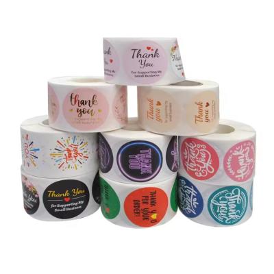 China Custom Printed Round Plastic Synthetic Paper Labels Vinyl Adhesive Waterproof for sale