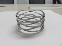 China Blackened Waved Spring - Rust-Resistant with High Tensile Strength (1,250 MPa) for Precision Machinery for sale