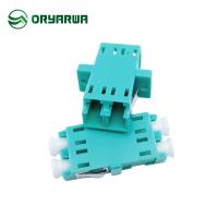 China Ceramic Sleeve 0.2dB LC/APC SM Duplex One Piece Type LC Fiber Optic Adapter With Flange for sale