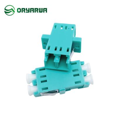 China Ceramic Sleeve 0.2dB LC/APC SM Duplex One Piece Type LC Fiber Optic Adapter With Flange for sale
