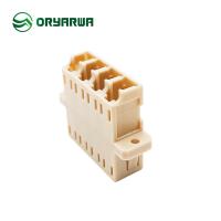 China Welded Asymmetric Structure LC Quad Fiber Optic Adaptor for sale