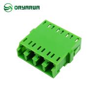 China Asymmetric Welded Type LC Fiber Optic Adapter Ceramic Sleeve Flangeless Quad for sale
