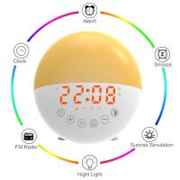 China Cute Oval Portable Alarm Clock Radio Touch Sensing Multi Color for sale