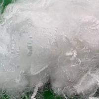 China Virgin Raw White Siliconized Hollow AA Grade Polyester Staple Fiber 0.9D*25mm Eco-friendly Filling Wadding Customizable for sale