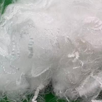 China Virgin Raw White Siliconized Hollow AA Grade Polyester Staple Fiber 0.9D*25mm Eco-friendly Filling Wadding Customizable for sale