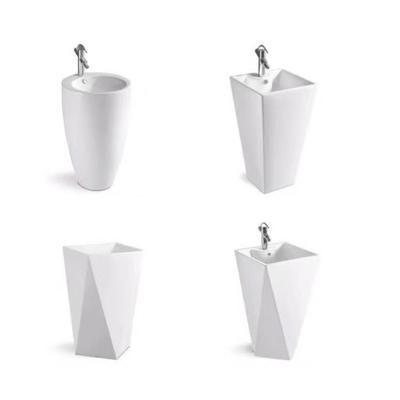 China Integrated One Piece Ceramic Pedestal Sink Floor Mounted Standing Washbasin 60x45cm for Hotel for sale