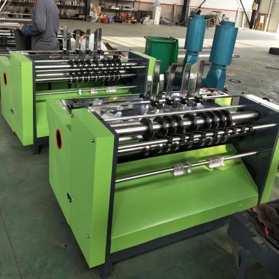 China PRY-1000 High Speed Partition Slotting Board Machine for sale