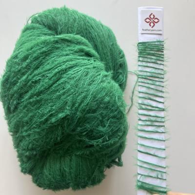 China 100% Nylon/Polyester Raw White Feather Yarn in Hank Form - Fancy Textile Yarn for Industrial Applications for sale