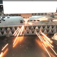 China 3015 1000W Whole Cover Fiber Laser Cutting Machine 4500kg For Stainless Steel Plate for sale