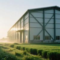 China Pre-engineered Steel Warehouse with Q355B Frame 400-1500mm Span for sale
