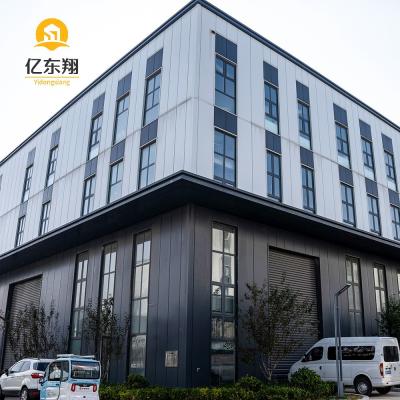 China Prefab Steel Warehouse with Sandwich Panel Walls for sale
