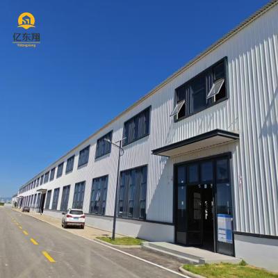 China Quick Assembly Industrial Prefabricated Steel Frame Building for Warehouse and Workshop for sale