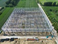 China 72m Large Span Three Story Heavy Steel Frame Building with High Precision Welded Cross Shaped Steel Columns for sale